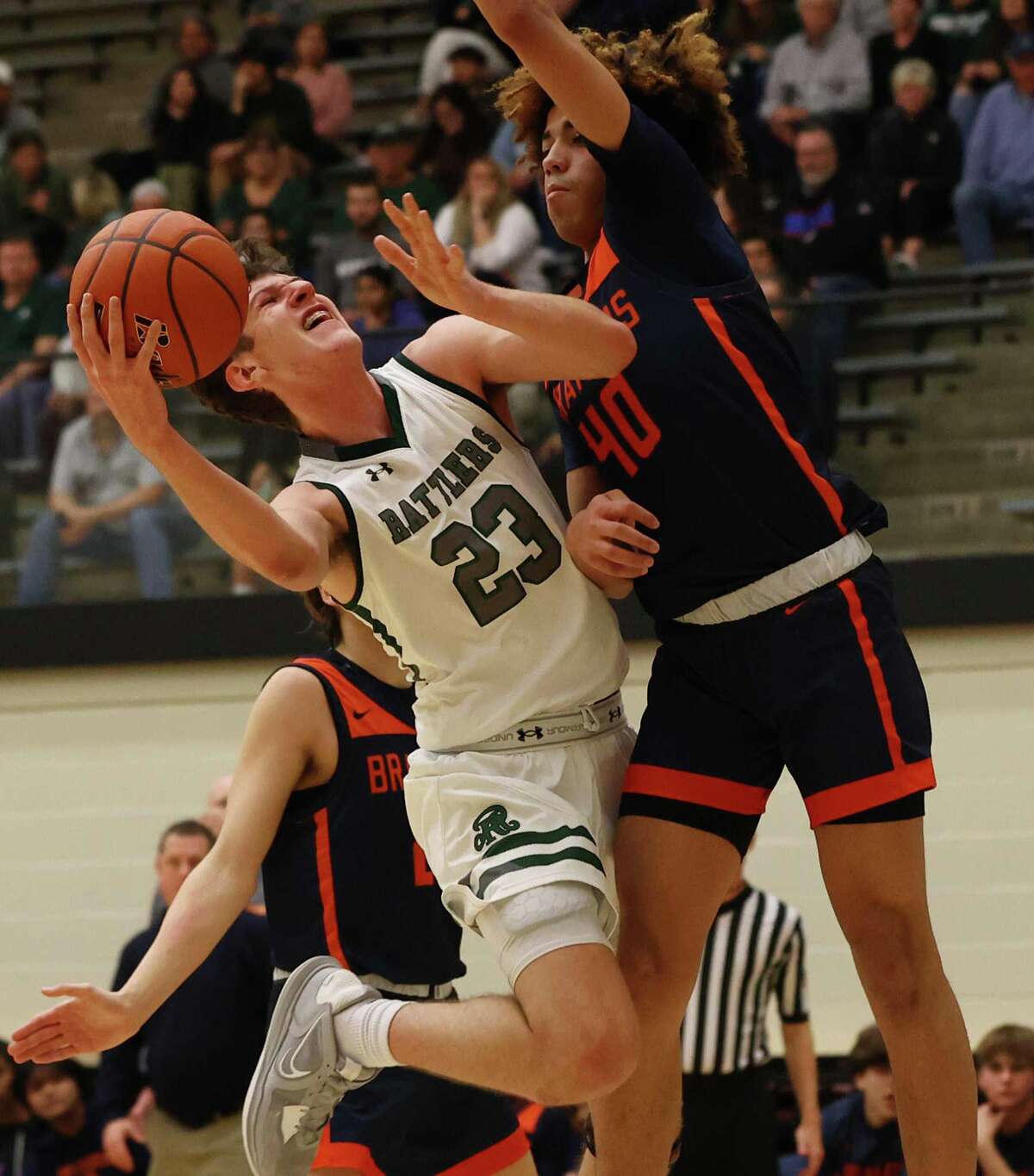 Boys basketball: Reagan stays in command in 28-6A