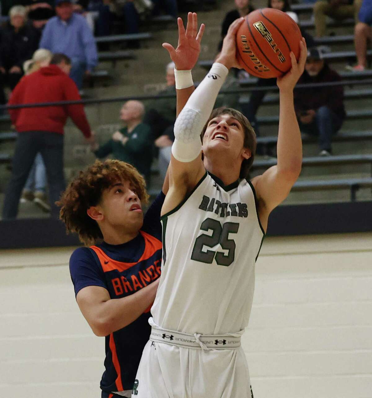 Boys basketball: Reagan stays in command in 28-6A