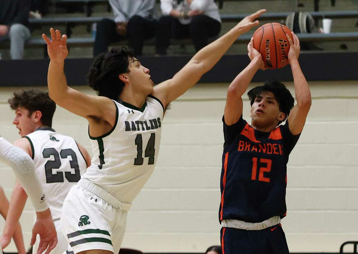 Boys basketball: Reagan stays in command in 28-6A