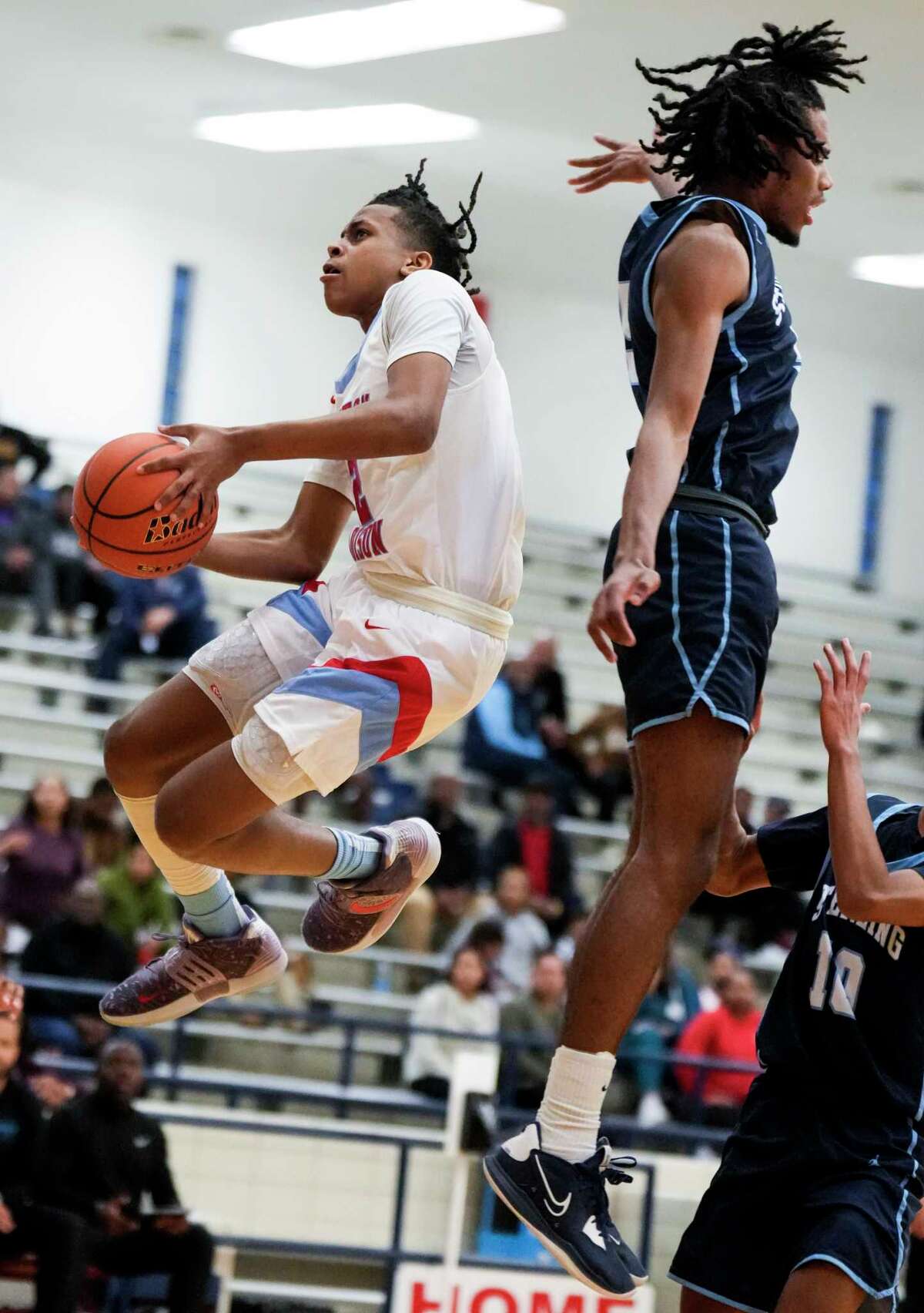 HS boys basketball: Madison tops Sterling in overtime