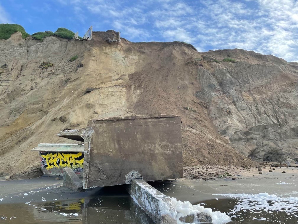 WW II structure falls 200 feet from cliff onto SF beach