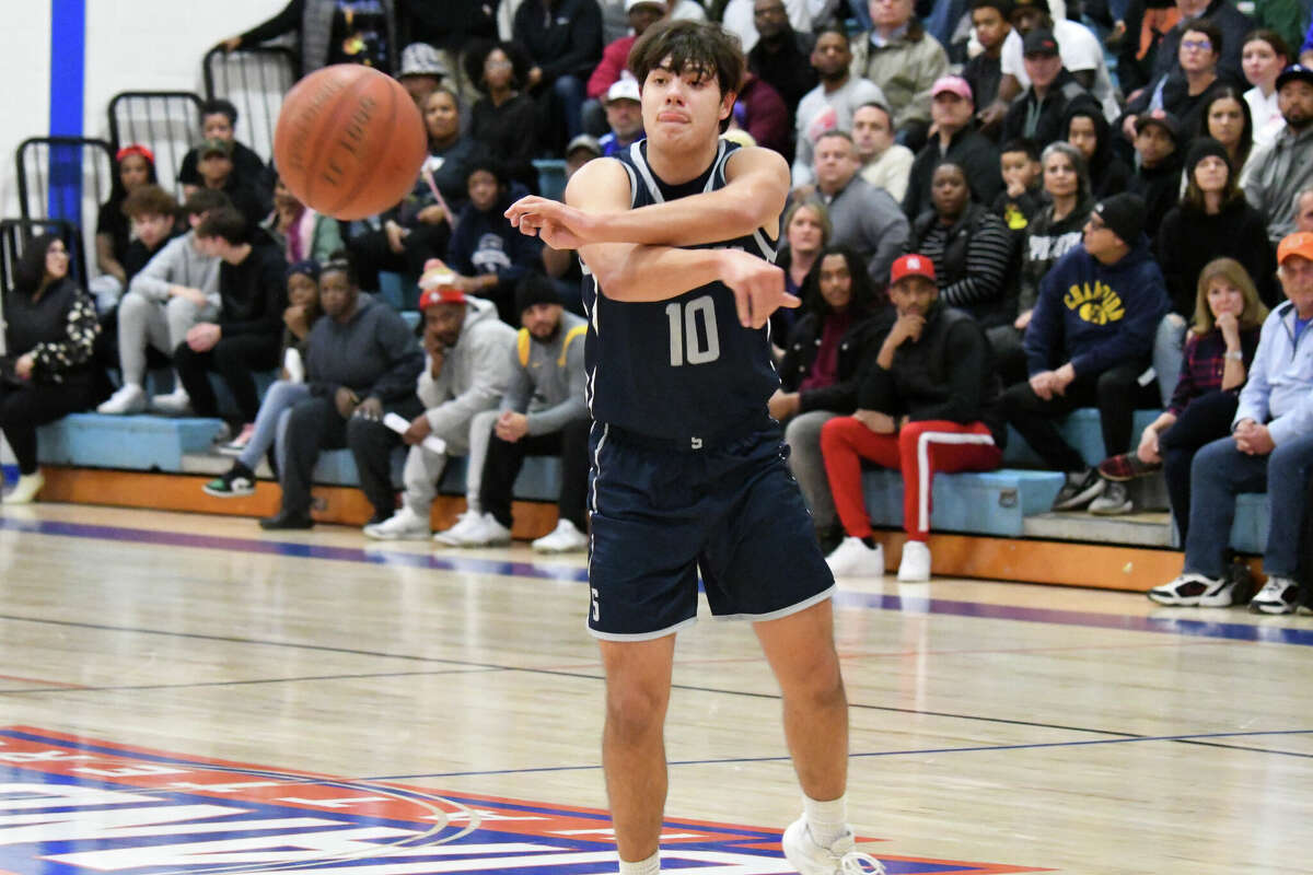 Danbury boys basketball defeats Staples, stays unbeaten.