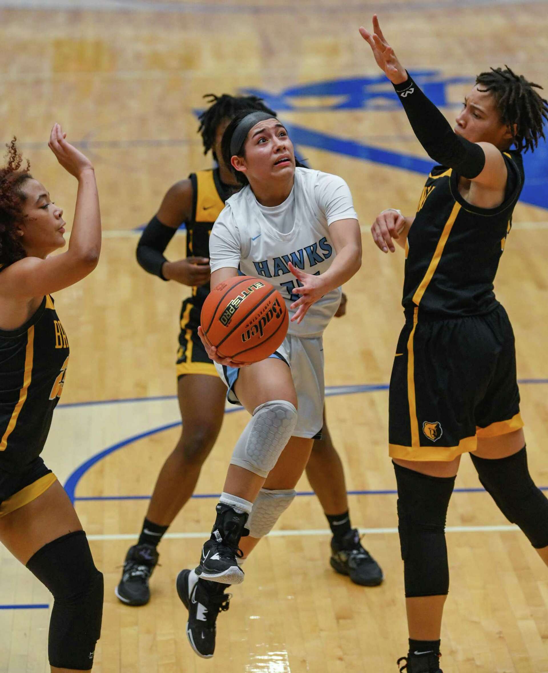 Girls basketball: Brennan toughs out overtime win over Harlan