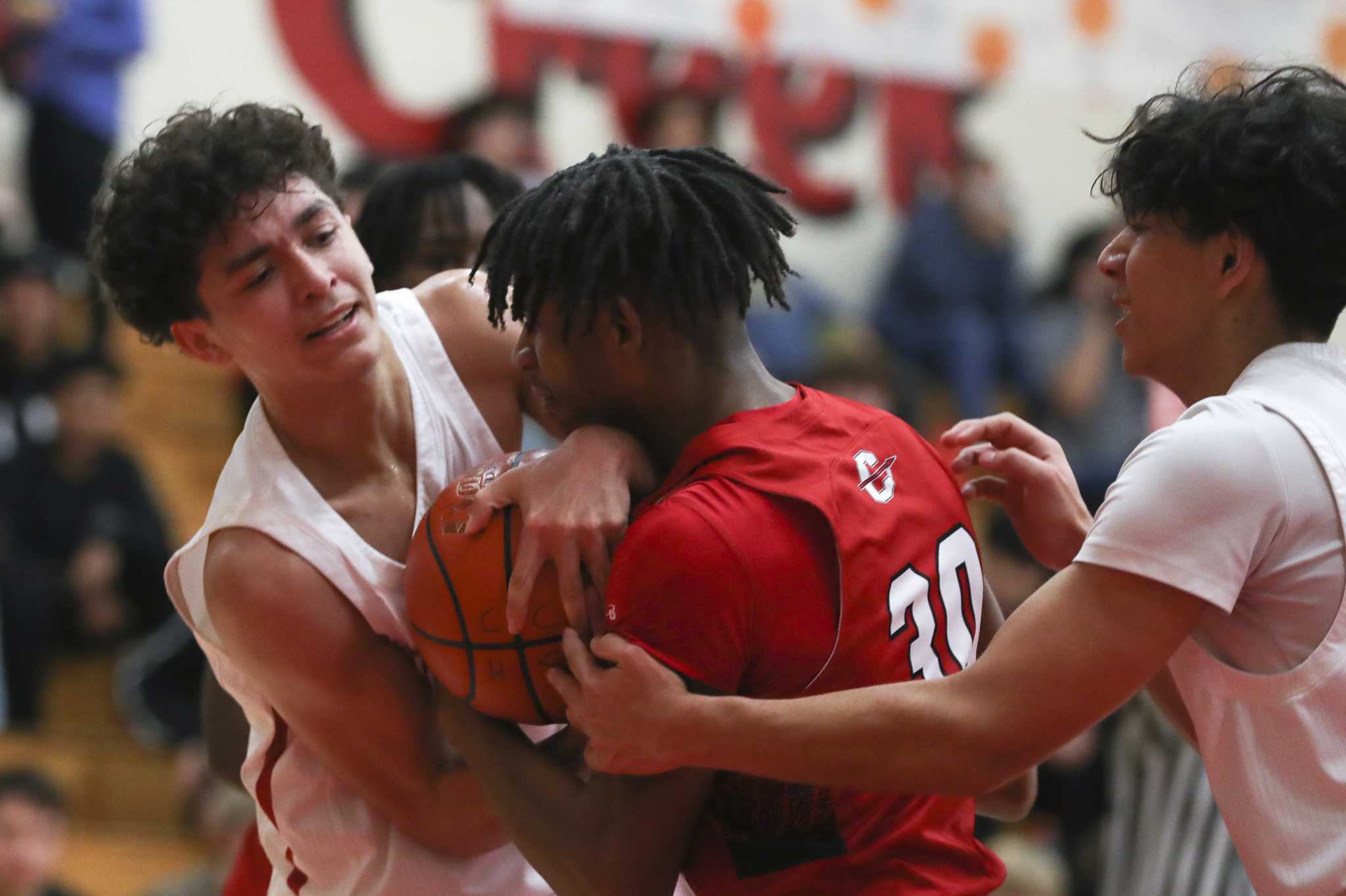 Houston boys basketball: Cleveland tops Caney Creek