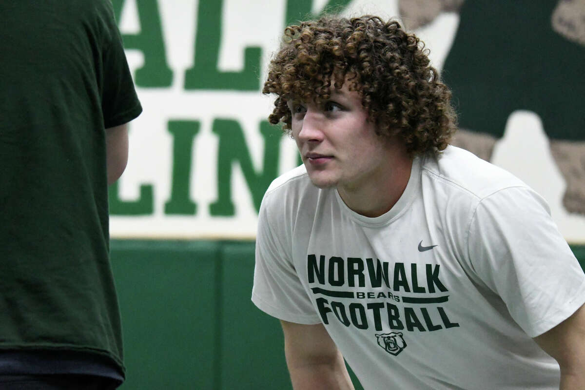 Norwalk wrestling twin brothers Brendan and Ryan Gilchrist.