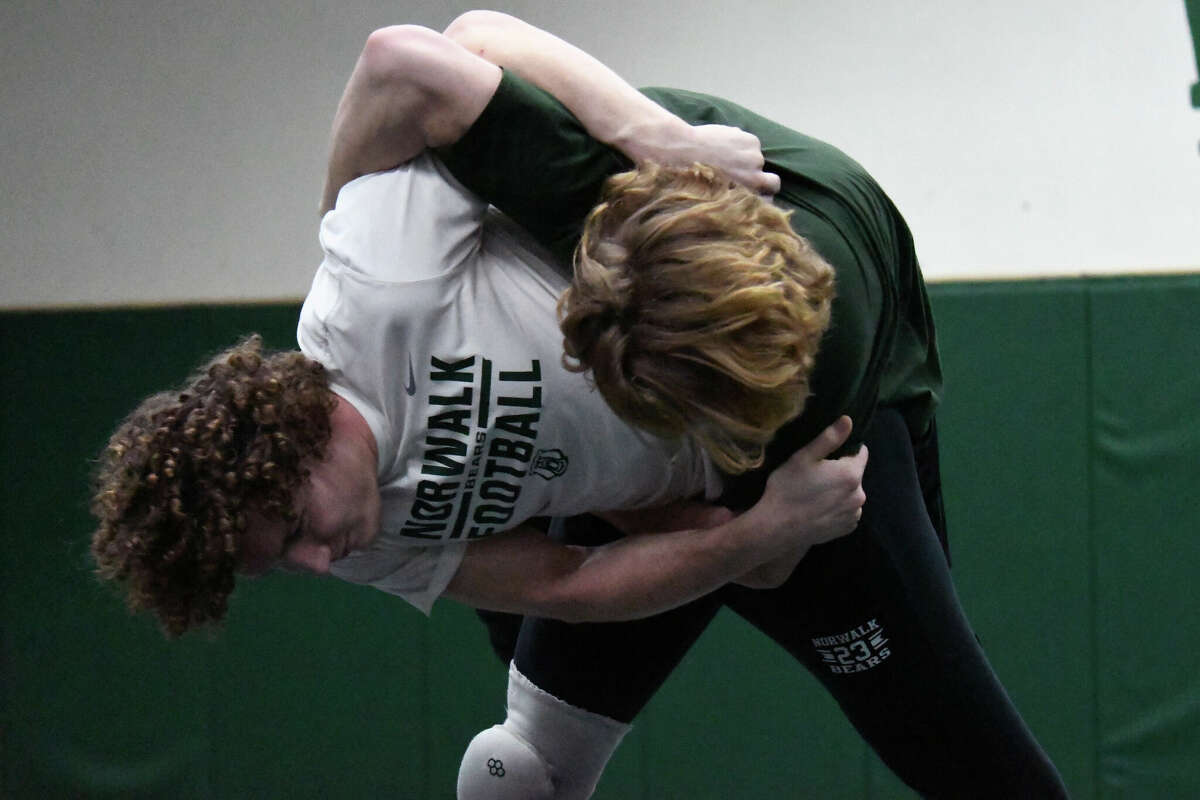 Norwalk wrestling twin brothers Brendan and Ryan Gilchrist.