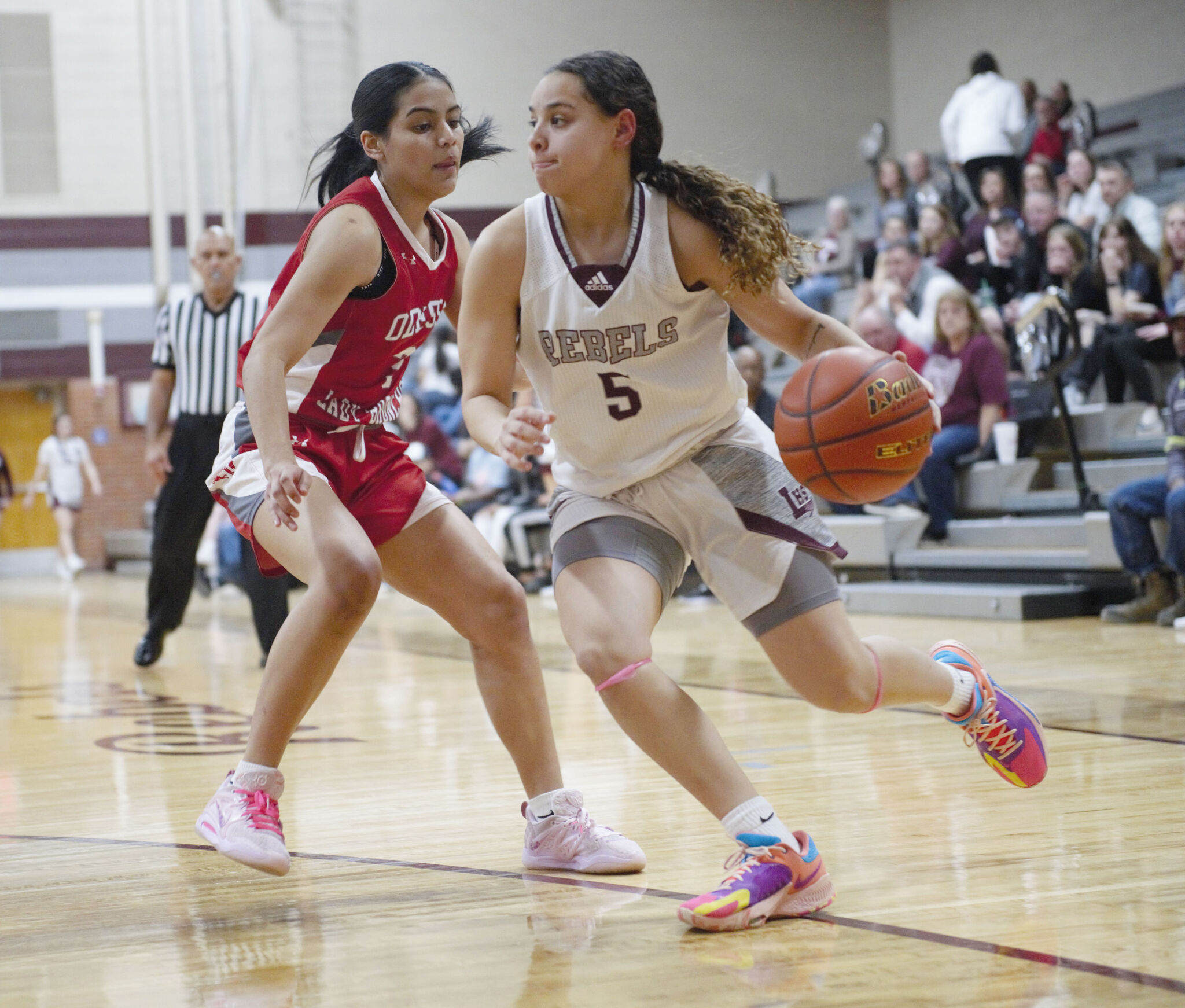 HS BASKETBALL: Lady Rebels sit in a good spot at halfway mark