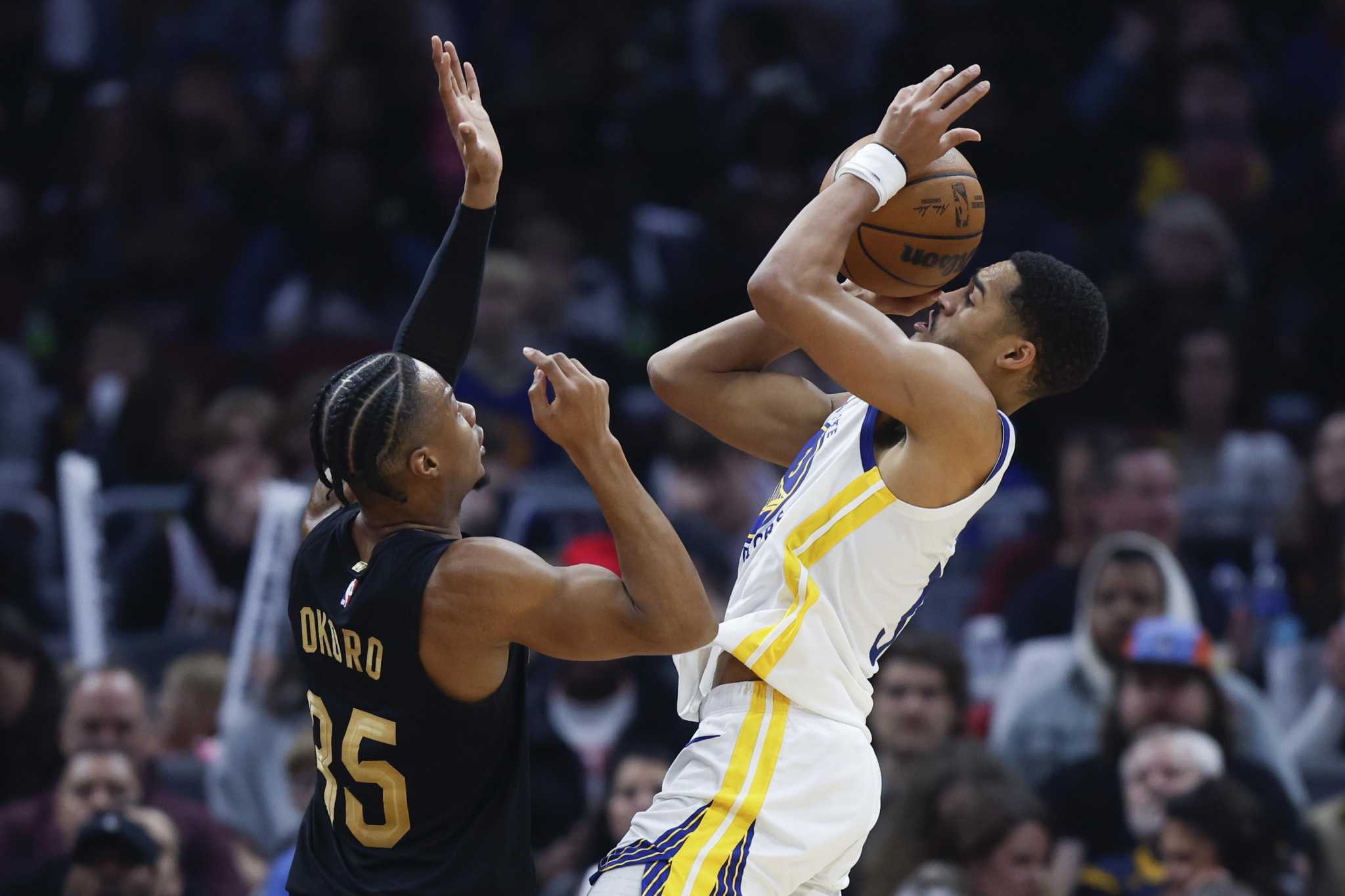 Short-handed Warriors pull off 120-114 win over Cavaliers