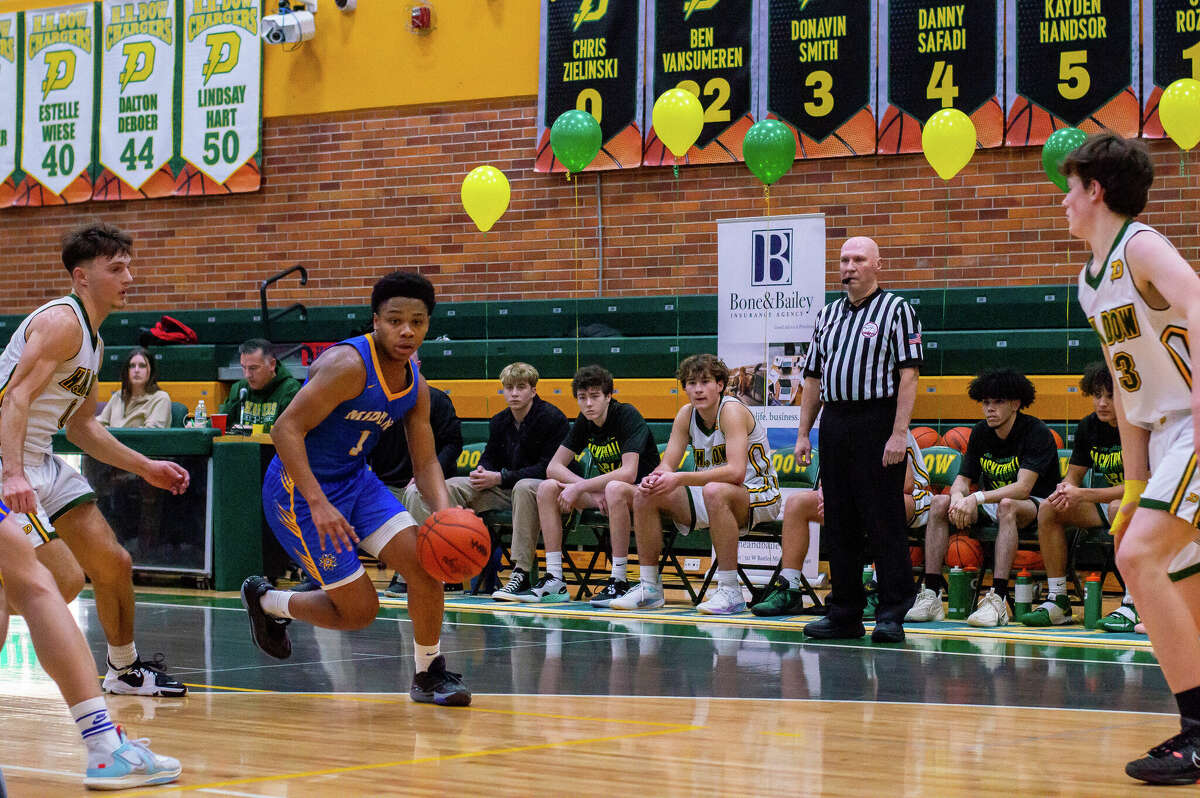 PHOTOS: Dow clashes with Midland in boys basketball