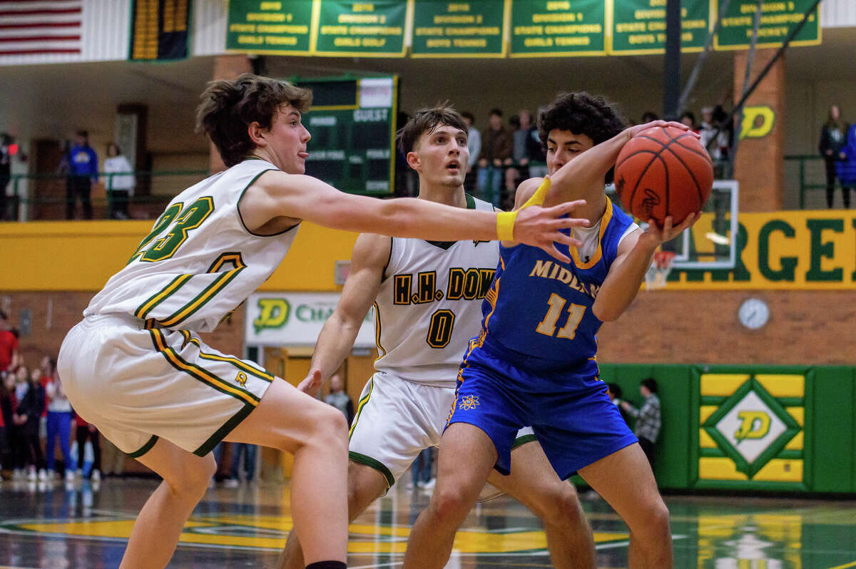 PHOTOS: Dow clashes with Midland in boys basketball