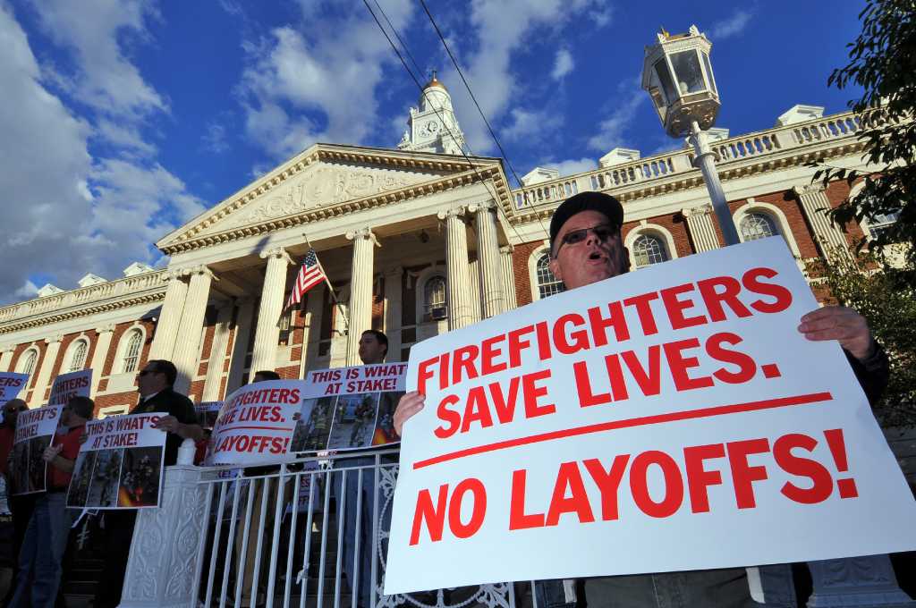 Crowd urges Schenectady to keep firefighters' jobs, station