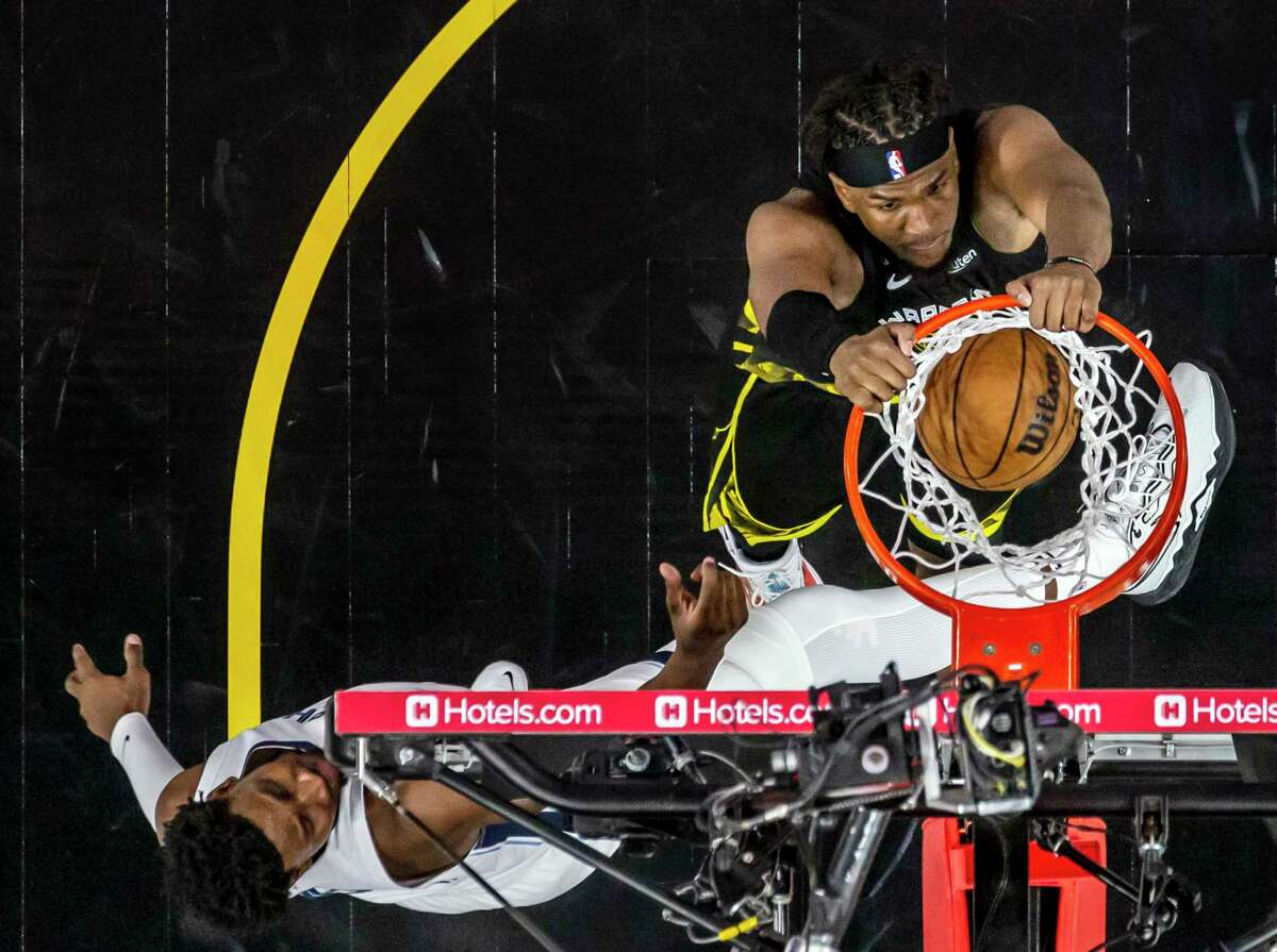 Warriors’ Kevon Looney honors Milwaukee coach who transformed his childhood