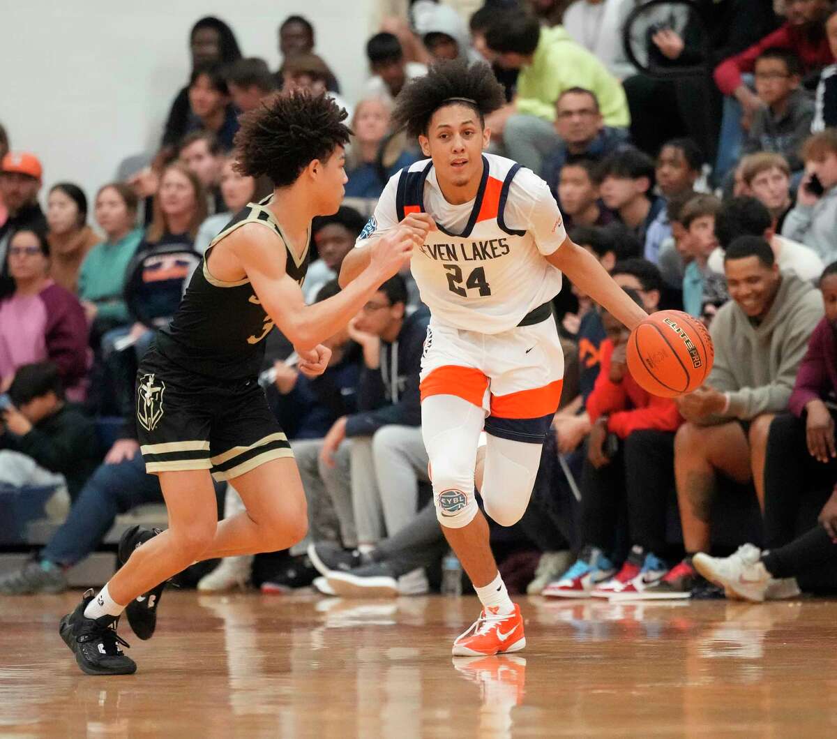 Boys basketball: Seven Lakes Spartans stay undefeated in 19-6A