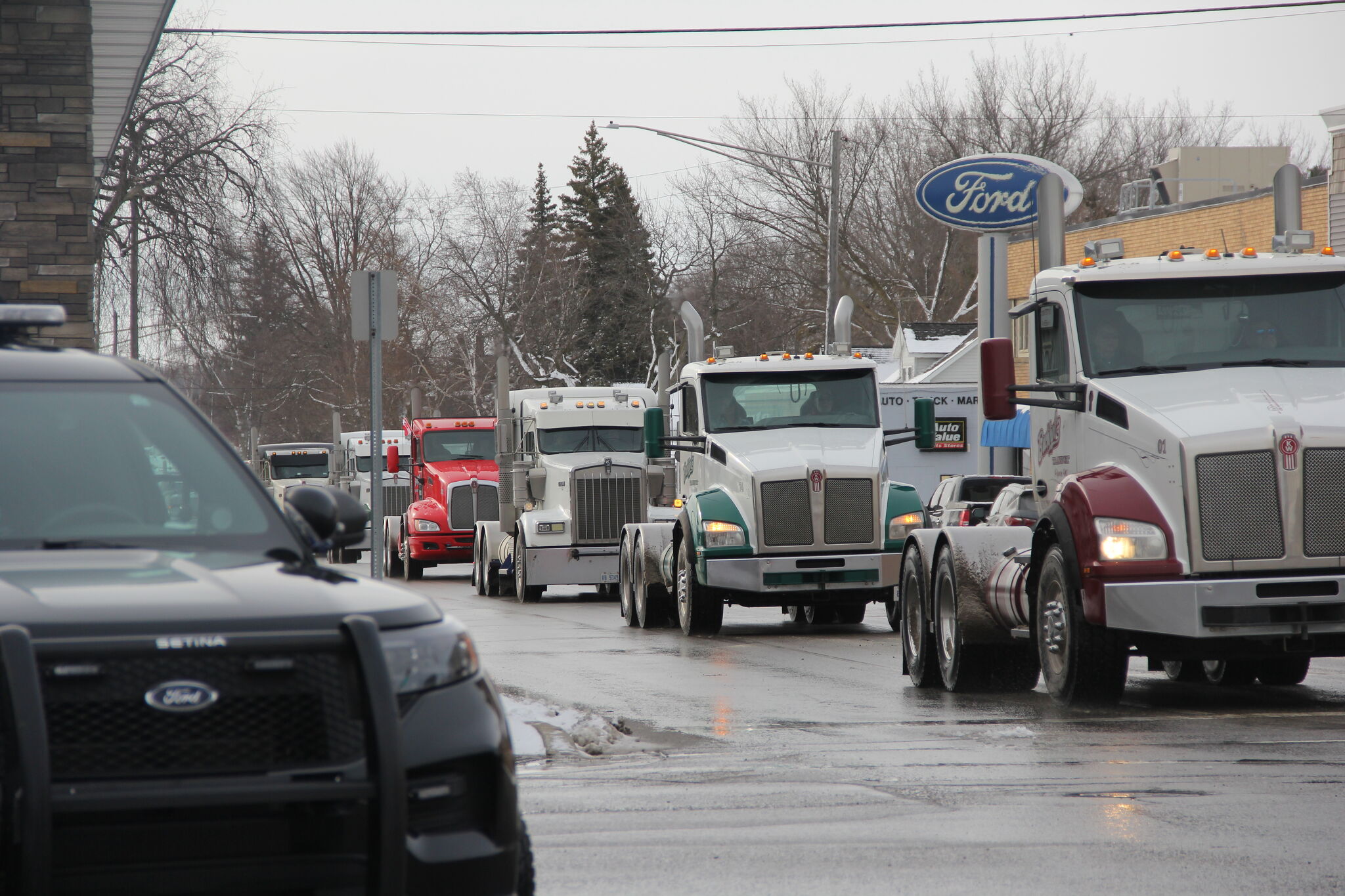 Memorial semi-truck parade through Huron County for Daniel Garnder