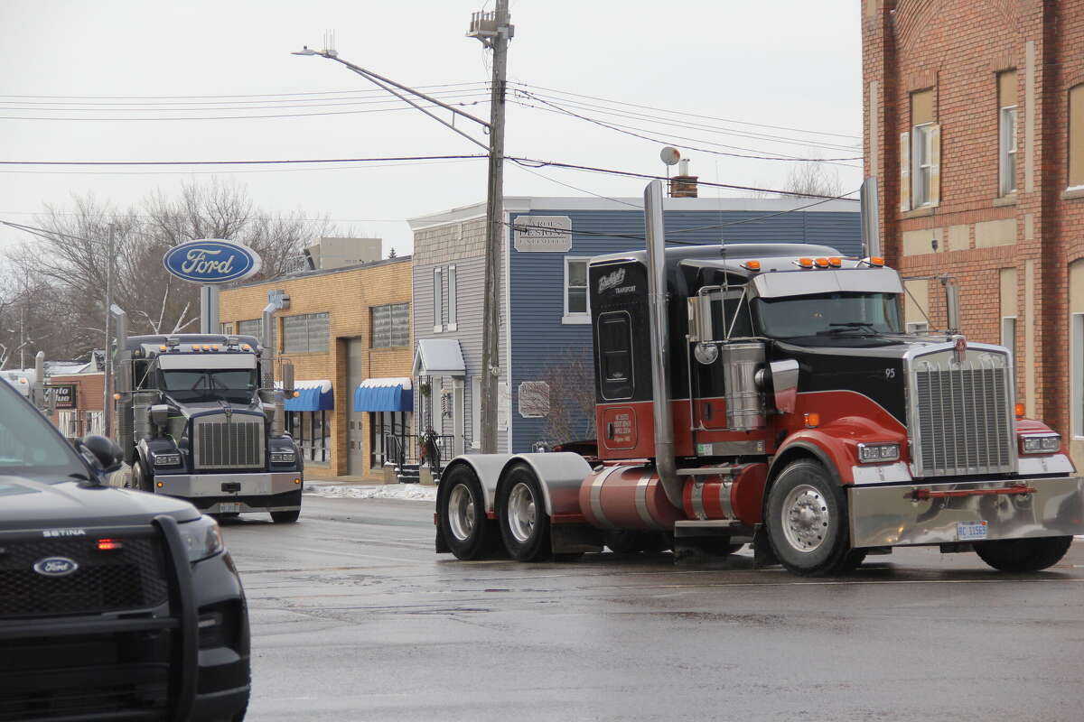 Memorial semi-truck parade through Huron County for Daniel Garnder