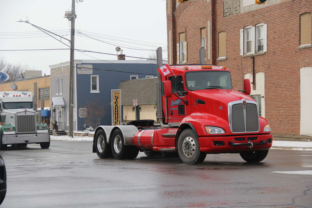 Memorial semi-truck parade through Huron County for Daniel Garnder