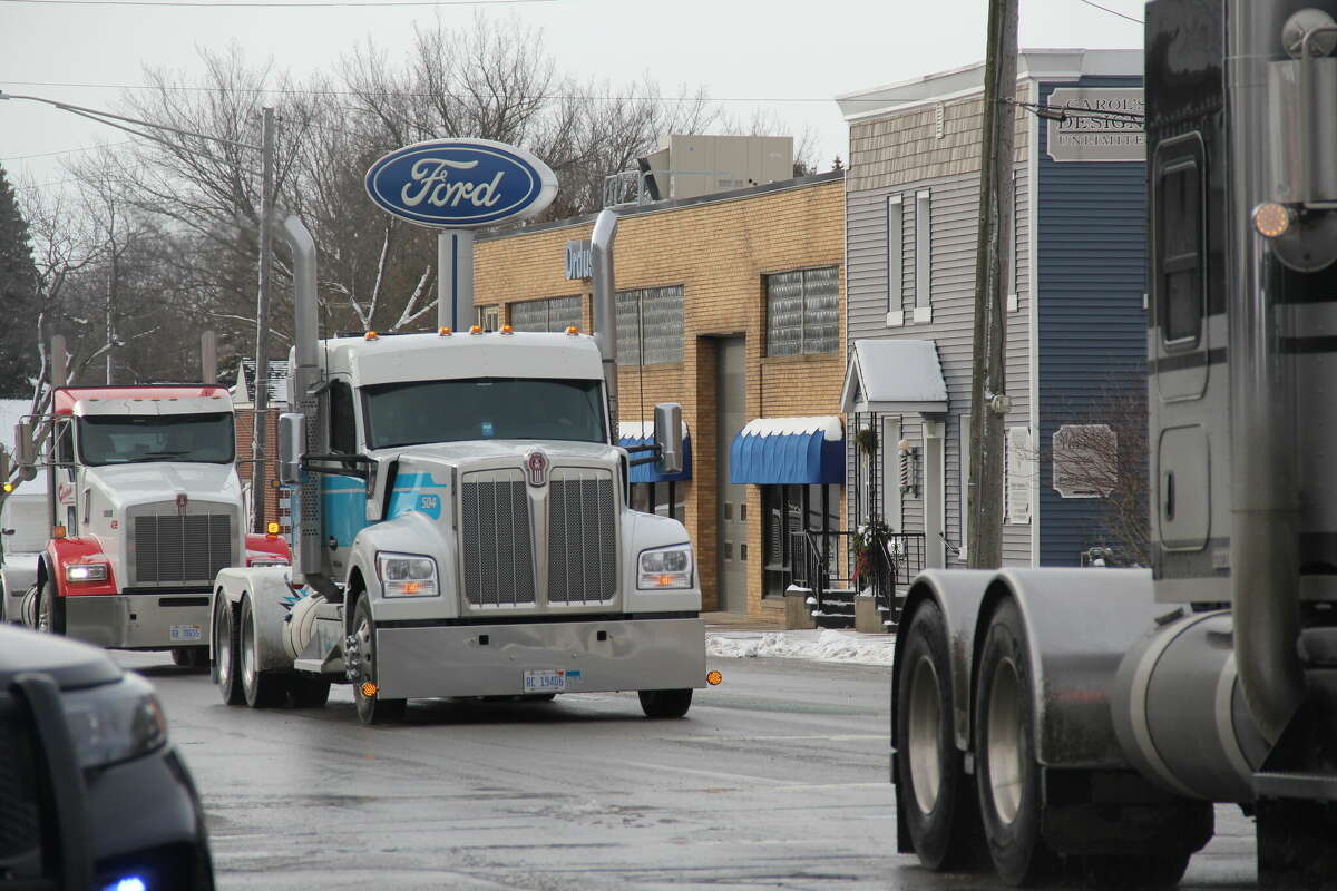 Memorial semi-truck parade through Huron County for Daniel Garnder