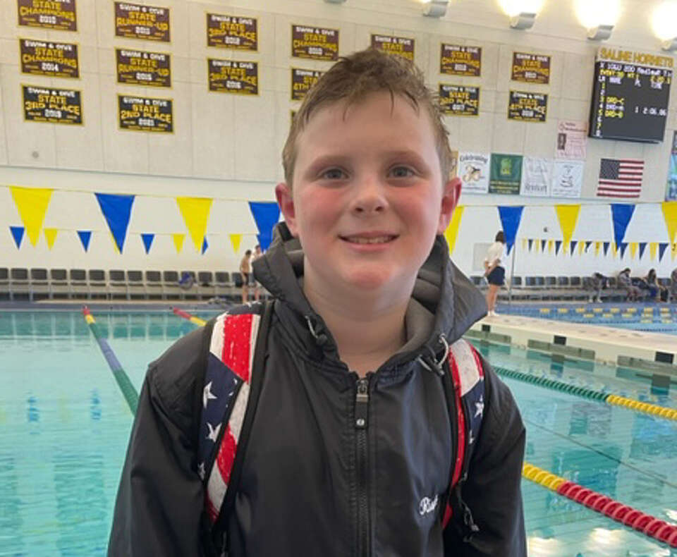 Midland third-grader breaks 32-year-old swim record