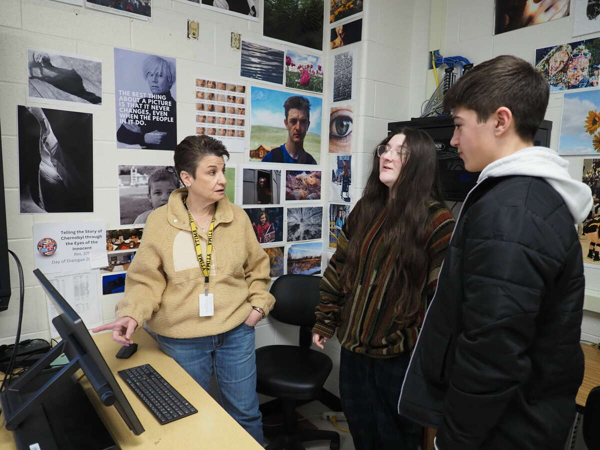 Amity students restore cherished photos for Hurricane Ian victims