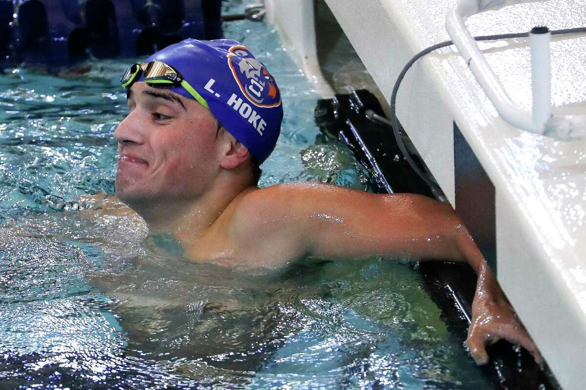 The Woodlands boys, girls dominate regional swim meet
