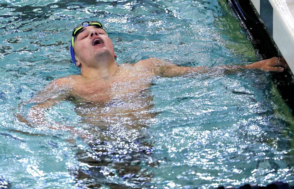 The Woodlands boys, girls dominate regional swim meet