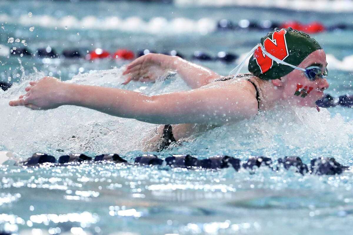 The Woodlands boys, girls dominate regional swim meet