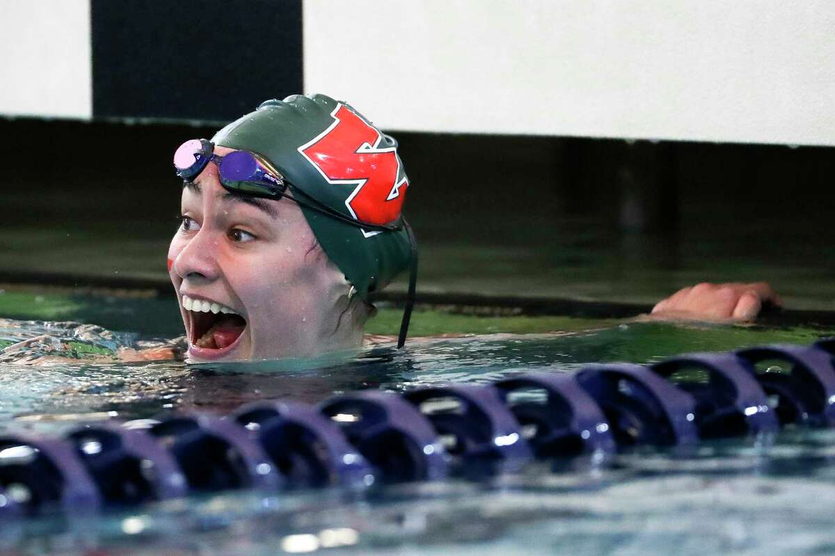 The Woodlands boys, girls dominate regional swim meet