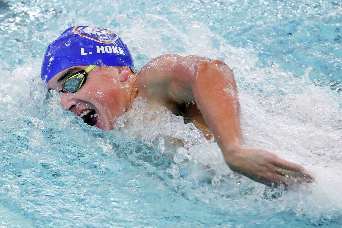 The Woodlands boys, girls dominate regional swim meet