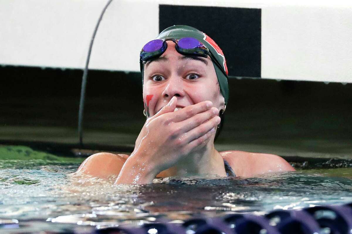 The Woodlands boys, girls dominate regional swim meet