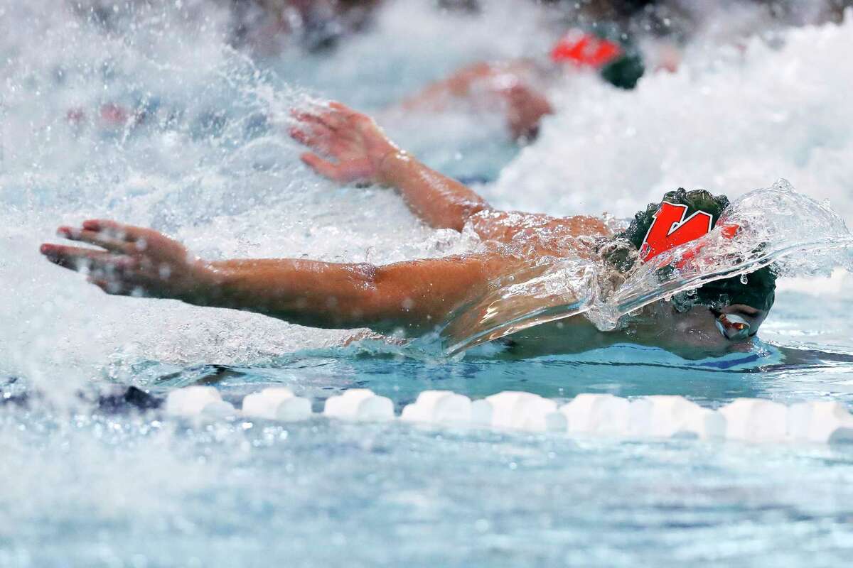 The Woodlands boys, girls dominate regional swim meet