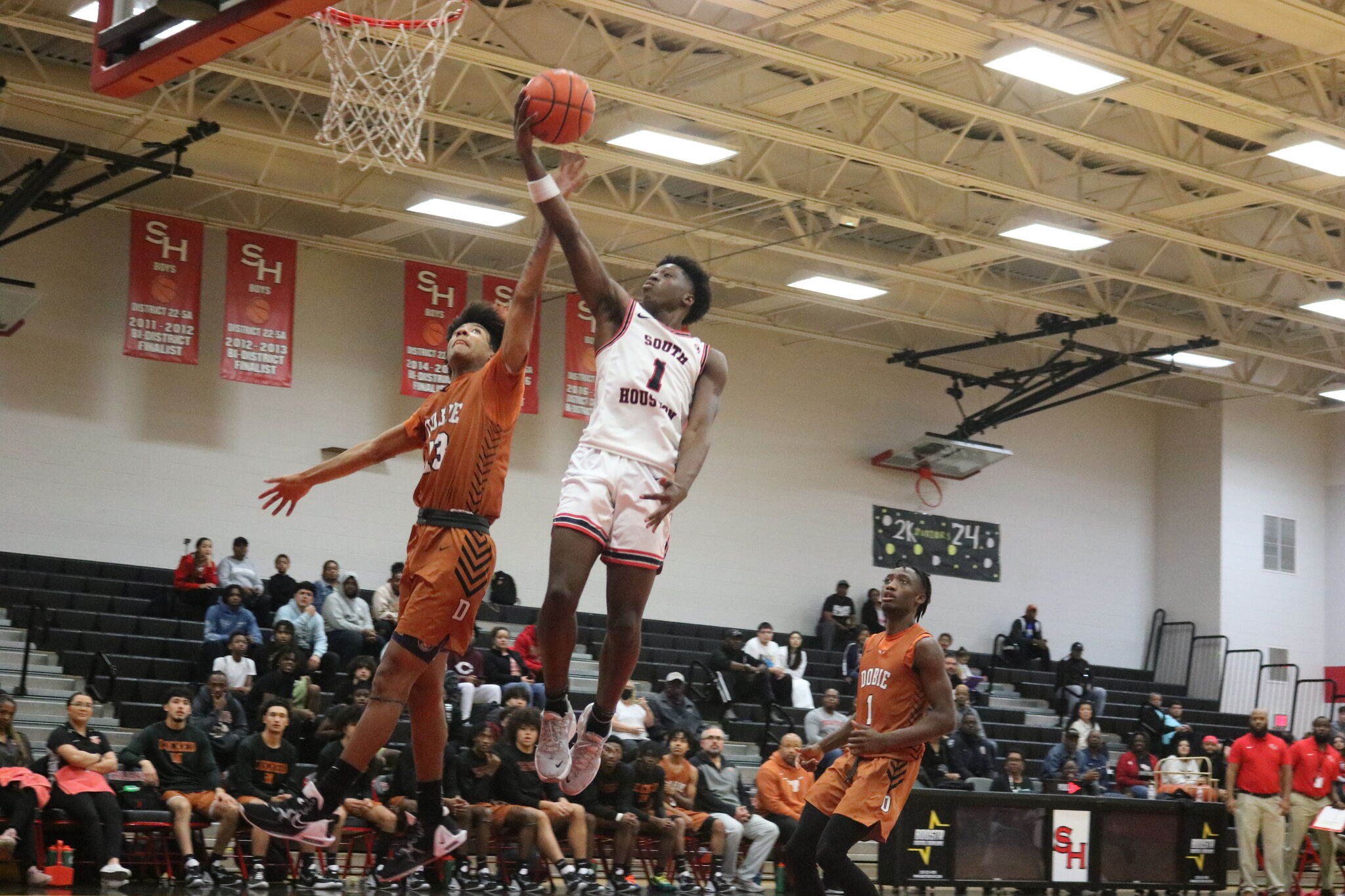 Trojans up their district record to 8-1