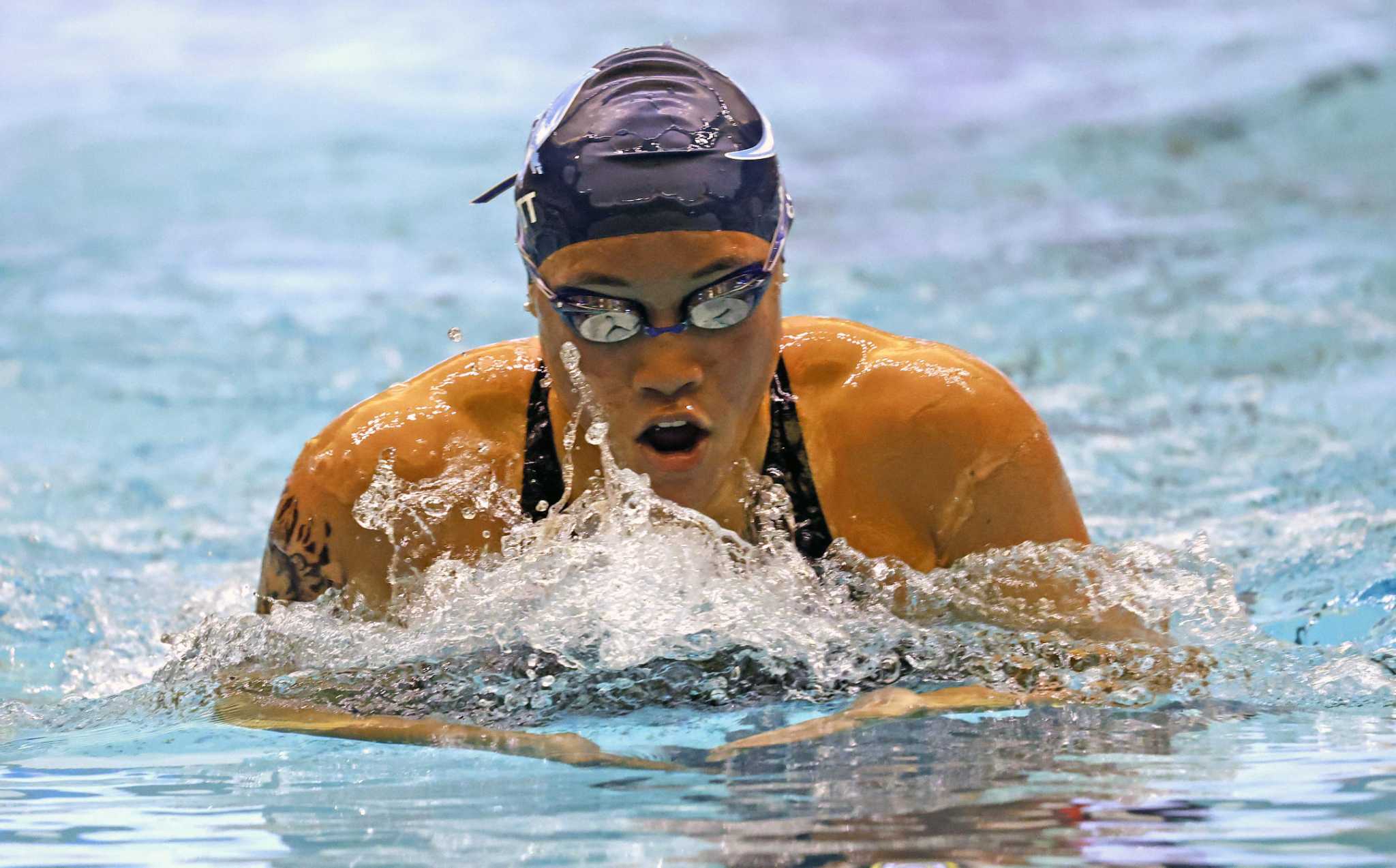 Johnson’s Jada Scott finds new golden paths at swimming regionals