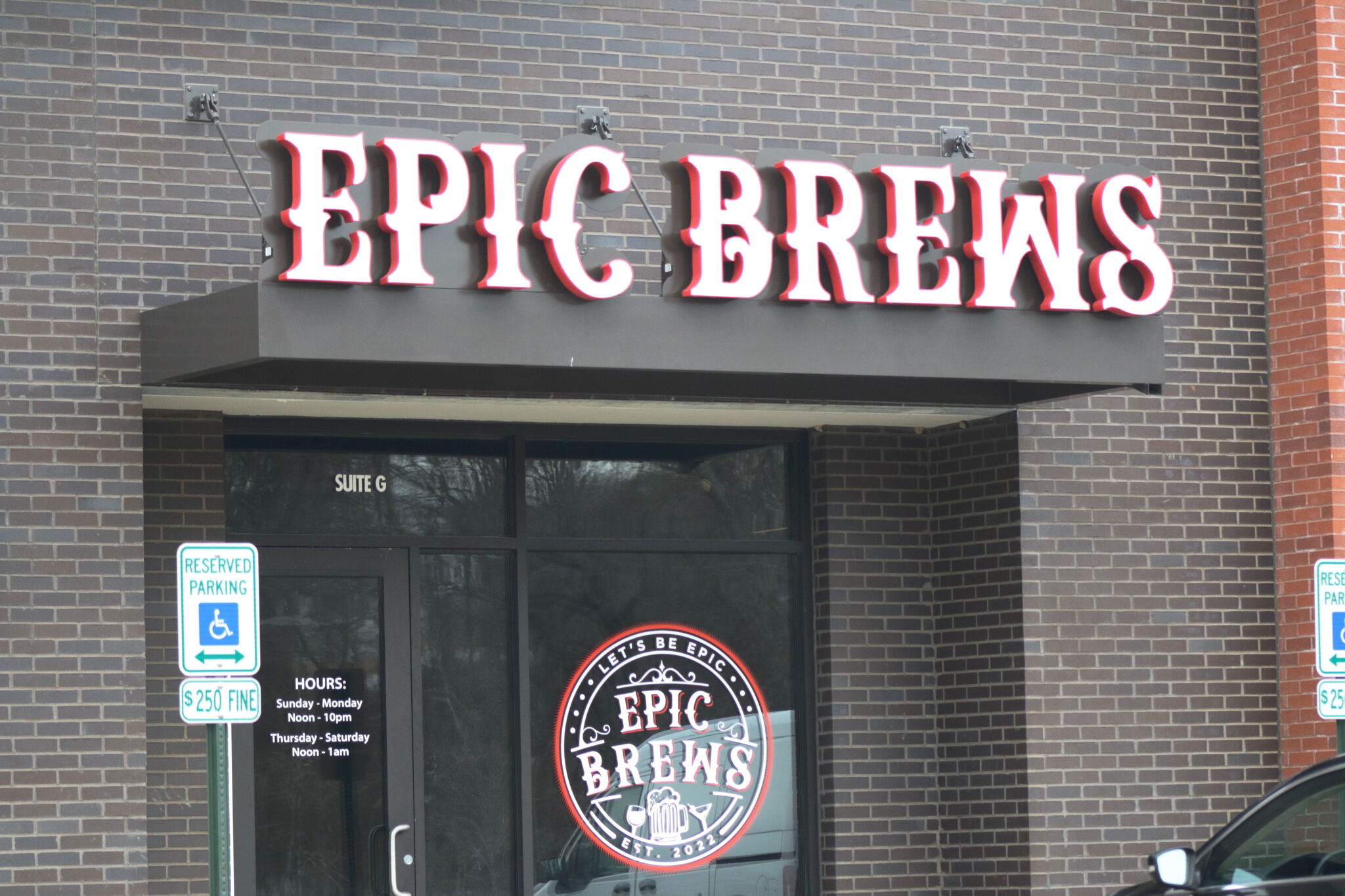 Epic Brews signage up; sports bar to open this spring