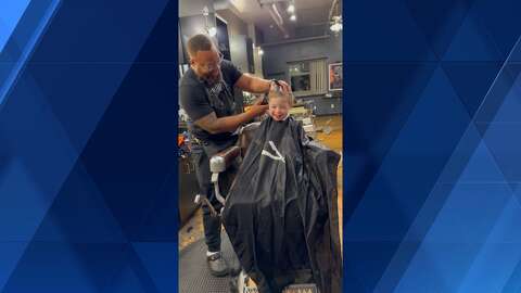 Barber goes viral in video of special connection with young boy