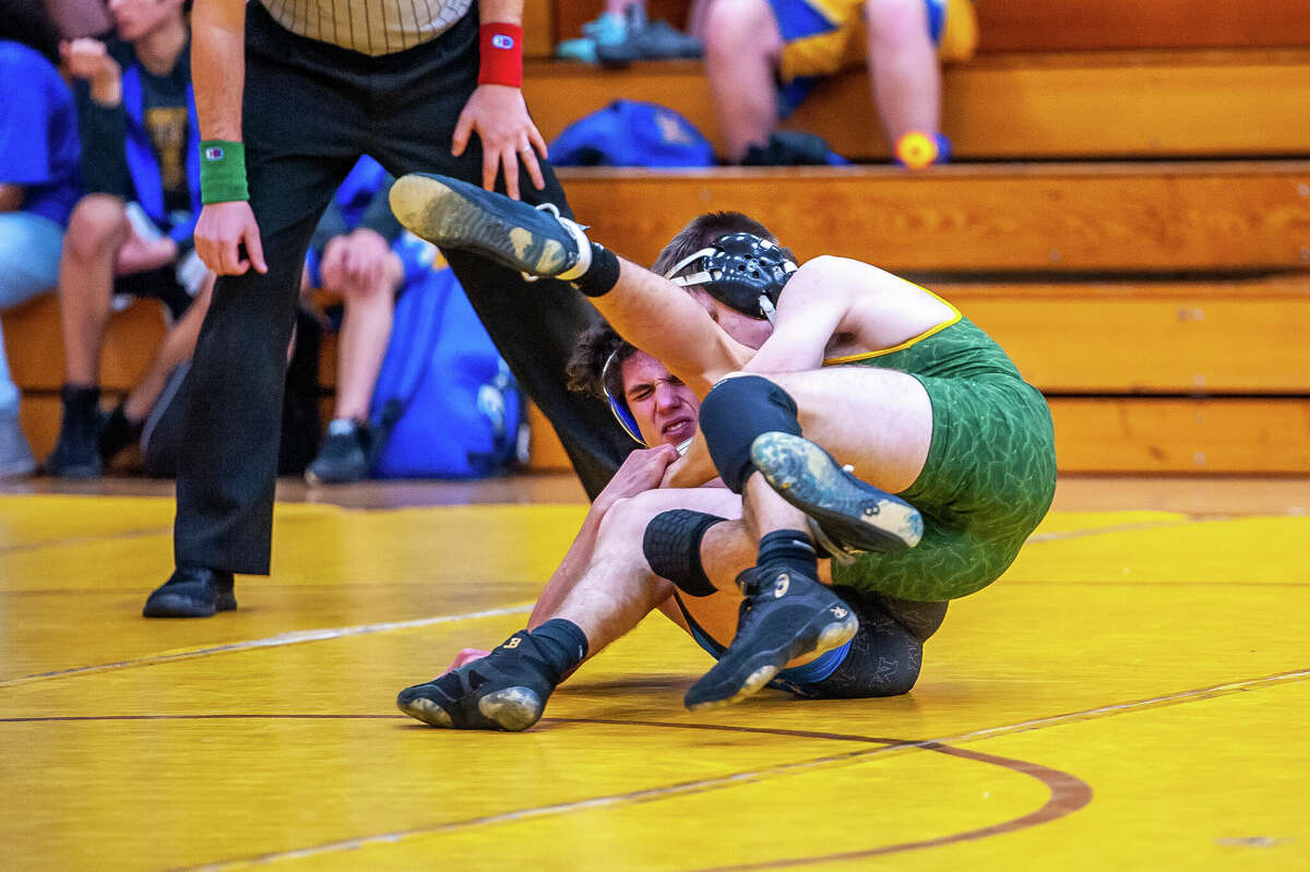 PHOTOS: Dow and Midland high take part in wrestling district tournamen