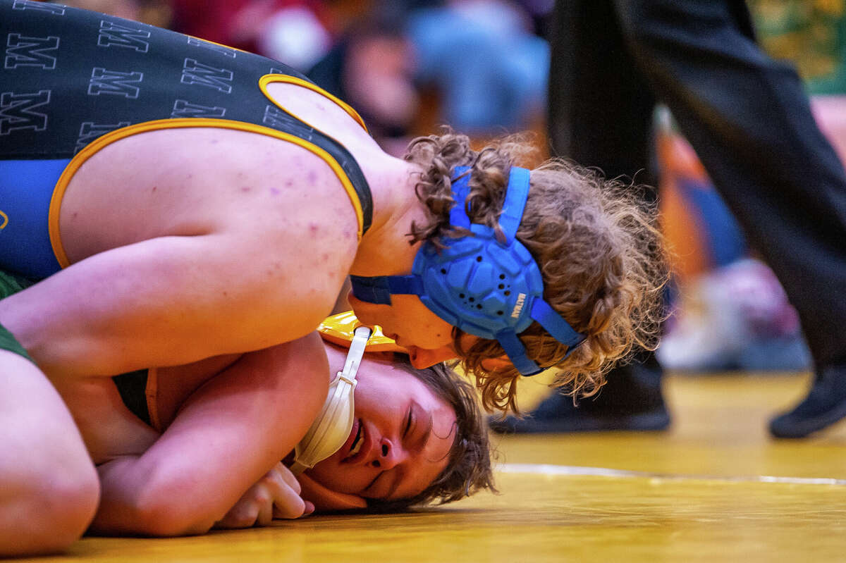 PHOTOS: Dow and Midland high take part in wrestling district tournamen
