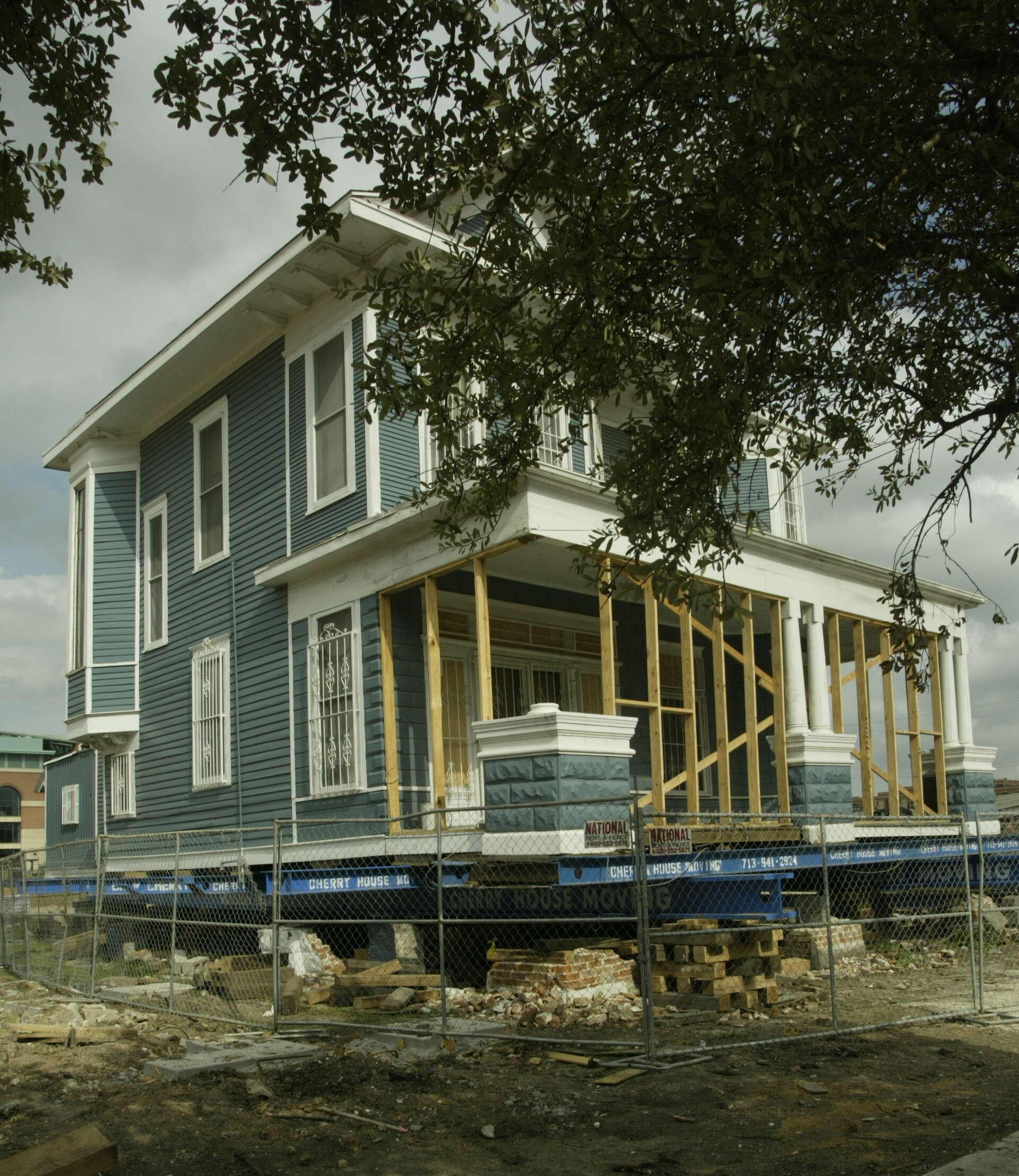 Why is the big blue Cohn house sitting in a Houston parking lot?