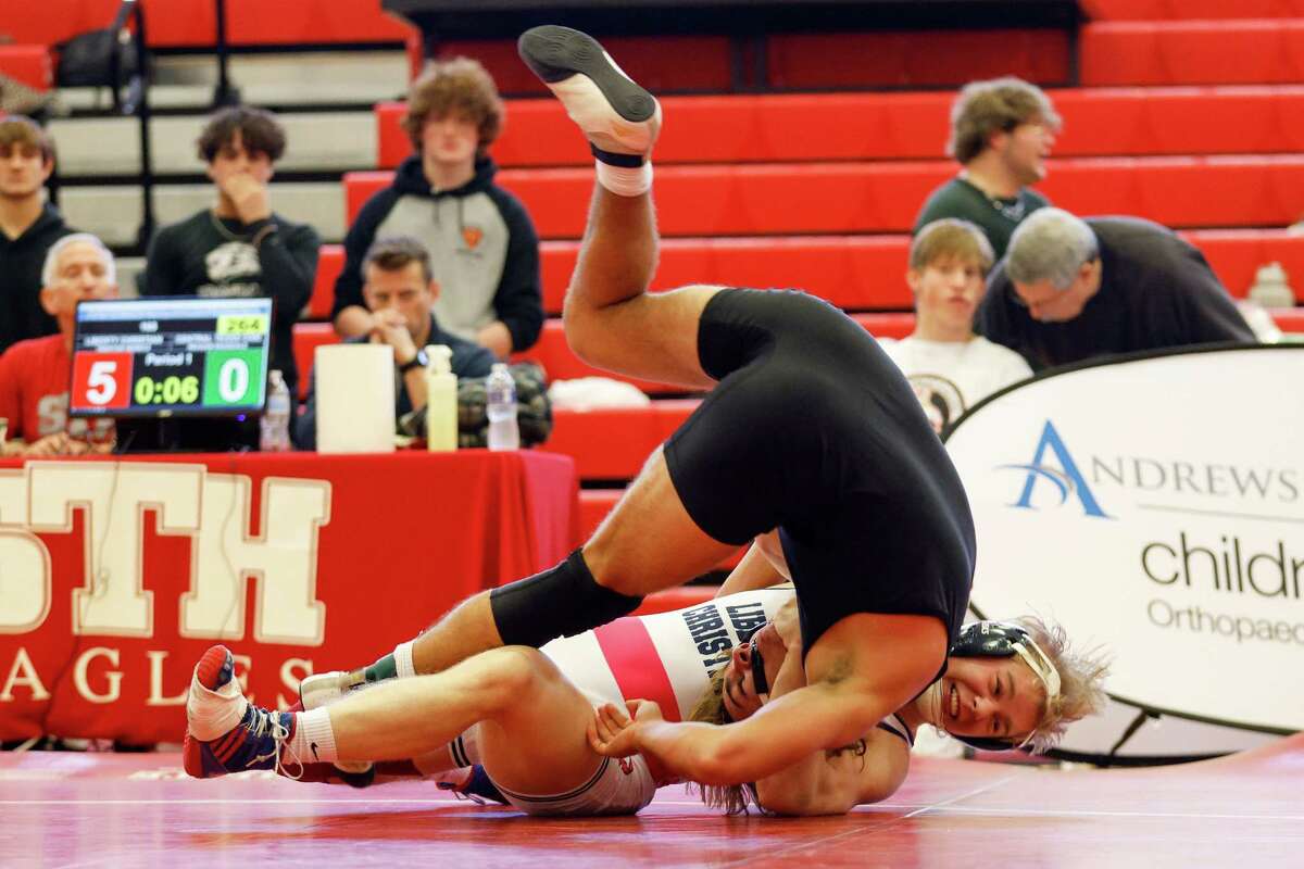 St. Thomas' Luke Malveaux, Sam Cordova win state wrestling titles