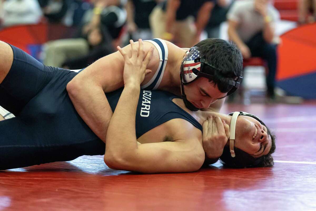 St. Thomas' Luke Malveaux, Sam Cordova win state wrestling titles