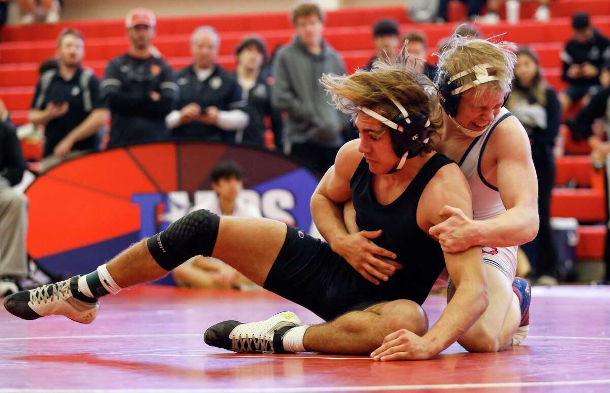 St. Thomas' Luke Malveaux, Sam Cordova win state wrestling titles