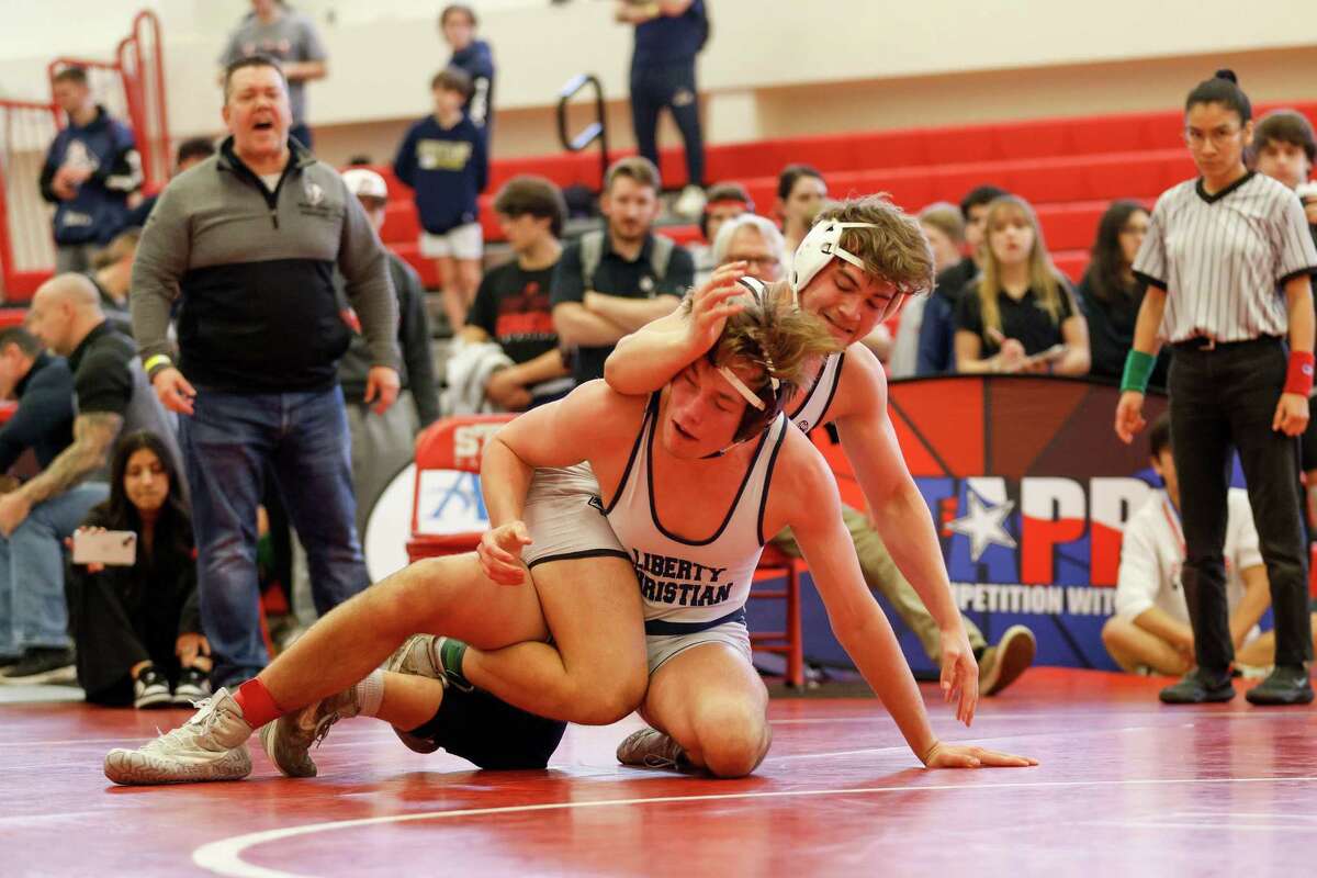 St. Thomas' Luke Malveaux, Sam Cordova win state wrestling titles