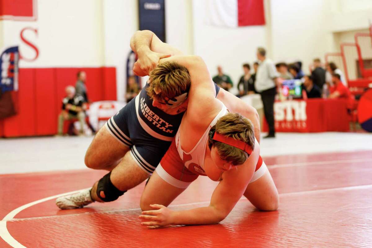 St. Thomas' Luke Malveaux, Sam Cordova win state wrestling titles