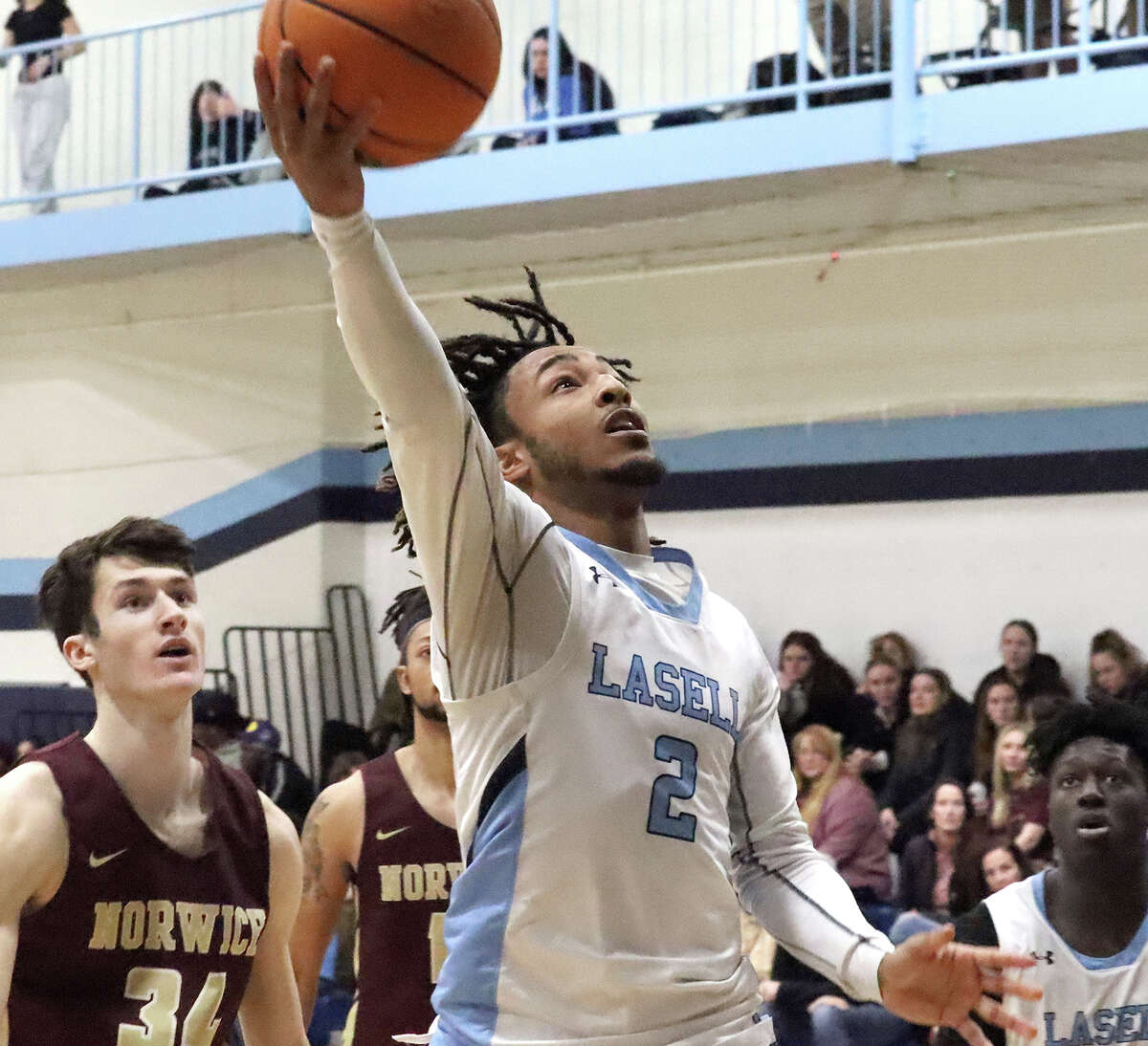 Norwalk's EJ Day of Lasell basketball, leads national D3 scoring