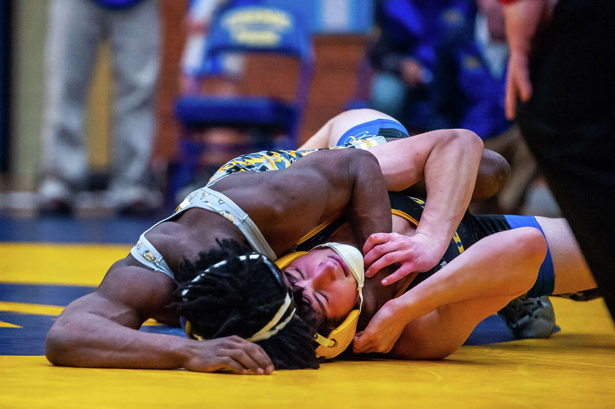 PHOTOS: Midland High School grapples in regional wrestling tournament