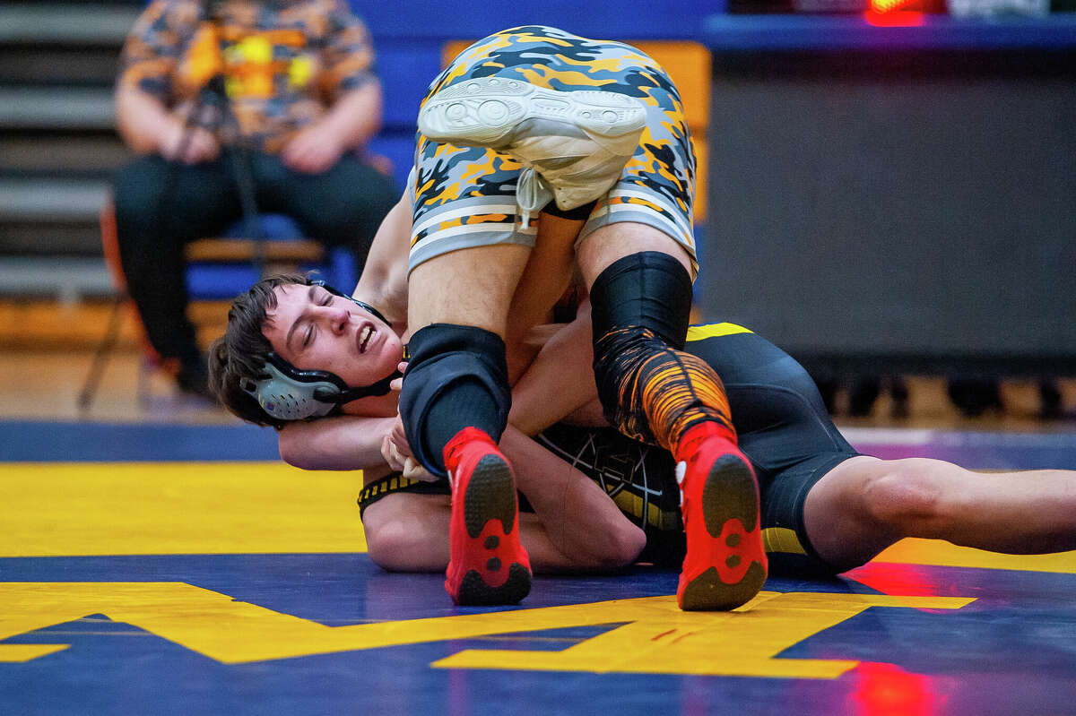 PHOTOS: Midland High School grapples in regional wrestling tournament