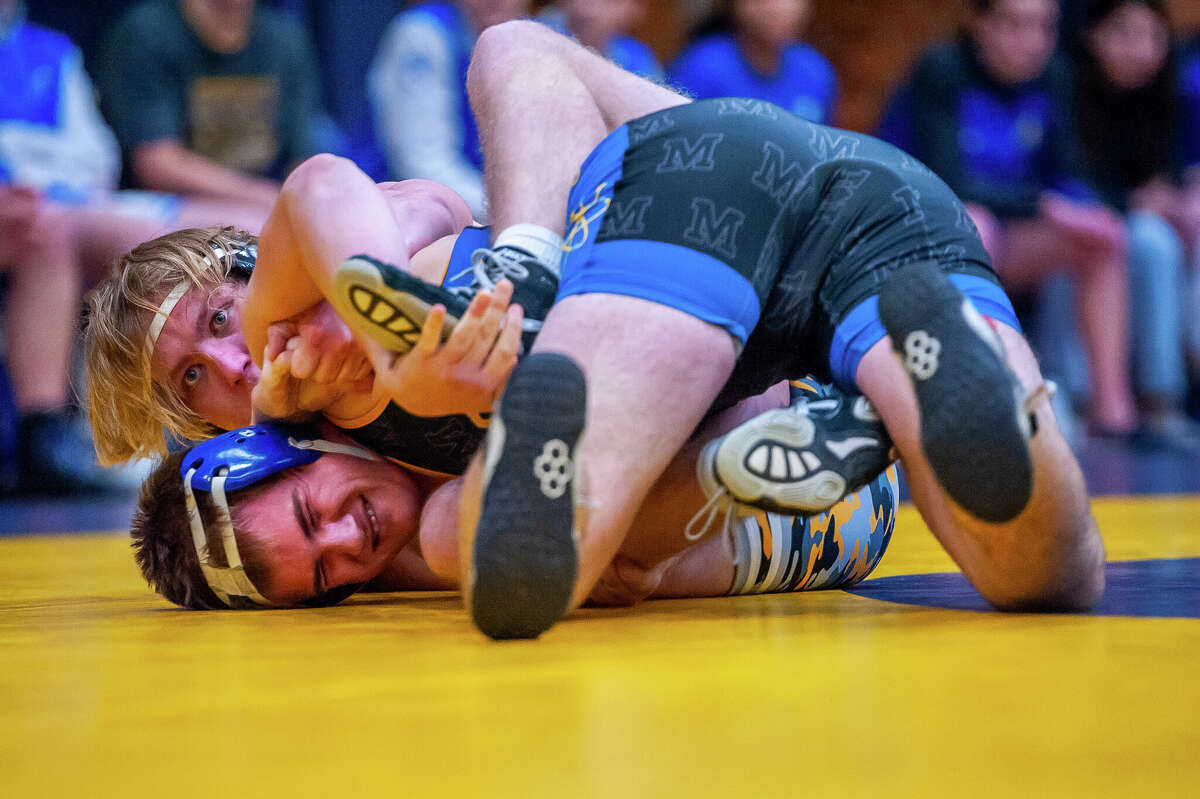 PHOTOS: Midland High School grapples in regional wrestling tournament