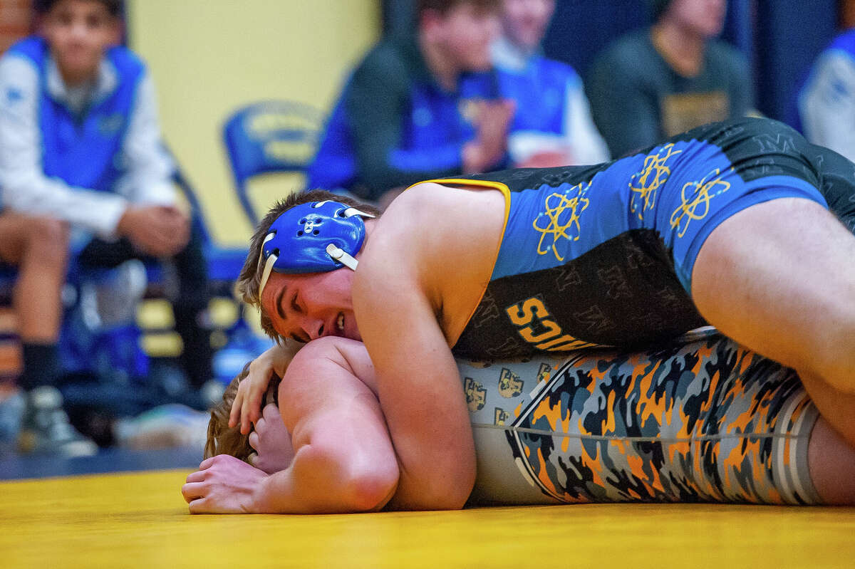 PHOTOS: Midland High School grapples in regional wrestling tournament