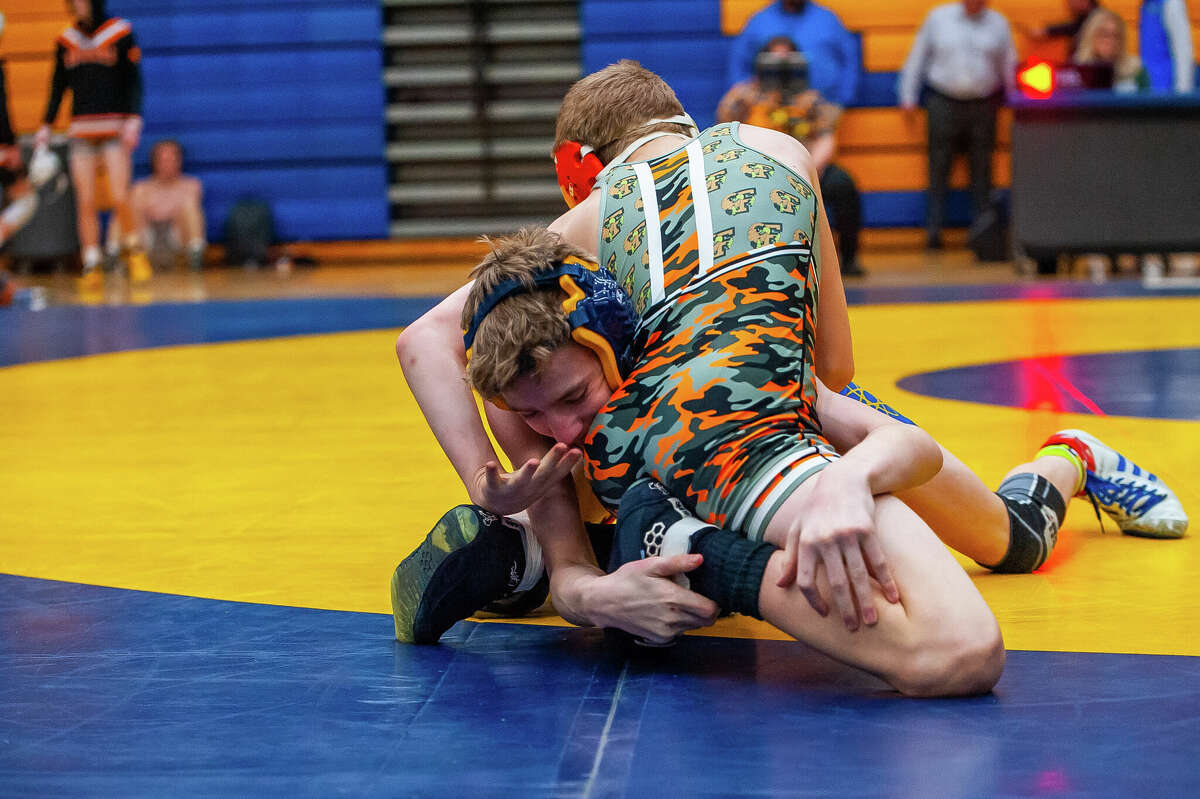 PHOTOS: Midland High School grapples in regional wrestling tournament