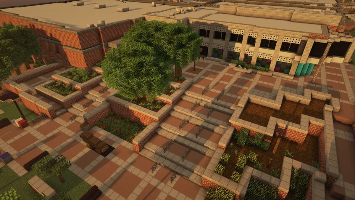 A Minecraft player is building Trinity University, block by block