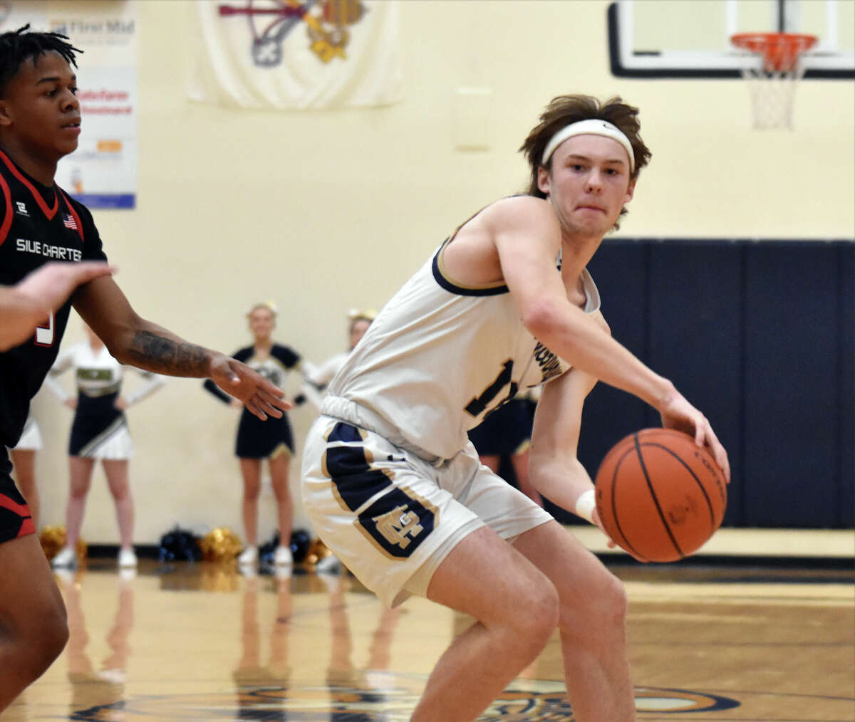 Jacob Huber scored 25 points to lead Father McGivney to win over SIUE